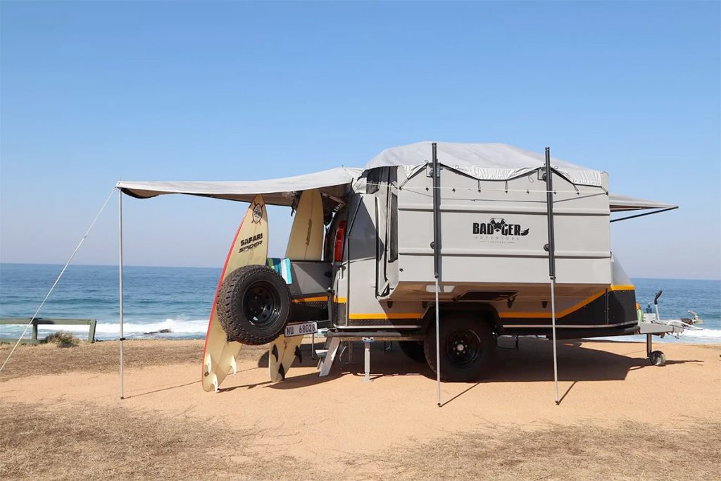 Badger Extreme camper trailer unfolds with a roof that transforms into ...
